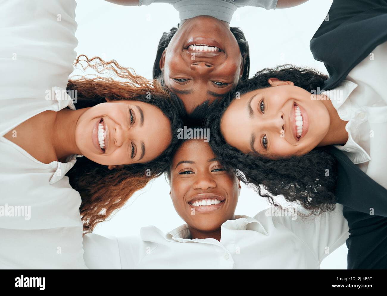 Together, we can do anything. Low angle portrait of a diverse group of ...