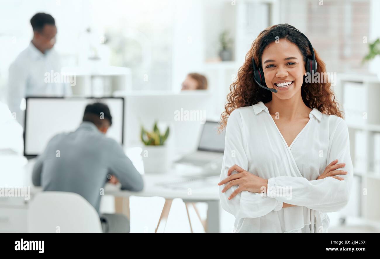 Ready to take your call. Cropped portrait of an attractive young female ...