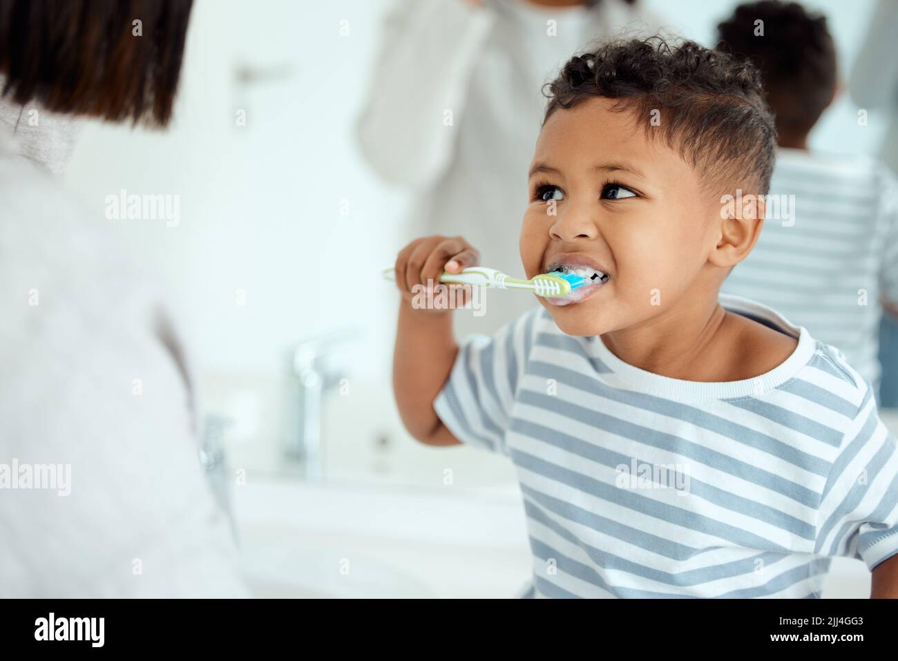 Look mom, I got every tooth. an adorable little boy brushing his teeth ...