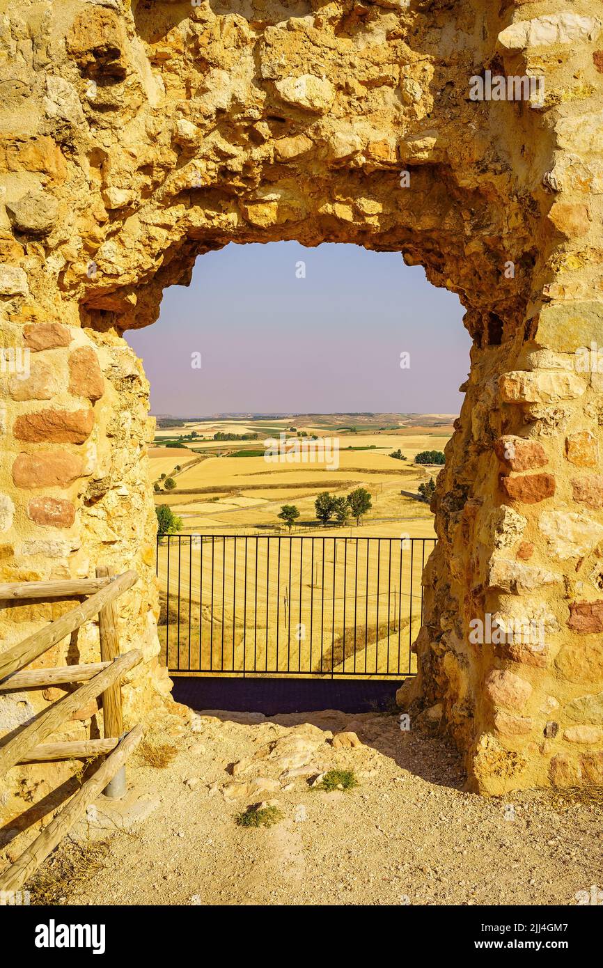 Arch-shaped door overlooking the outside of the wall of the castle of ...