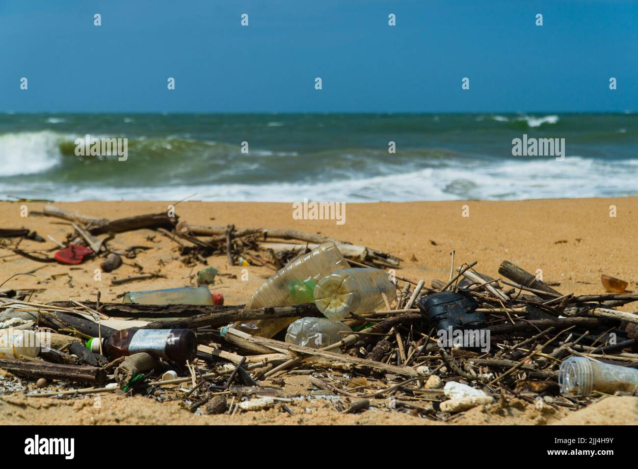 Discarded plastic debris trash pollution after sea swell storm ...