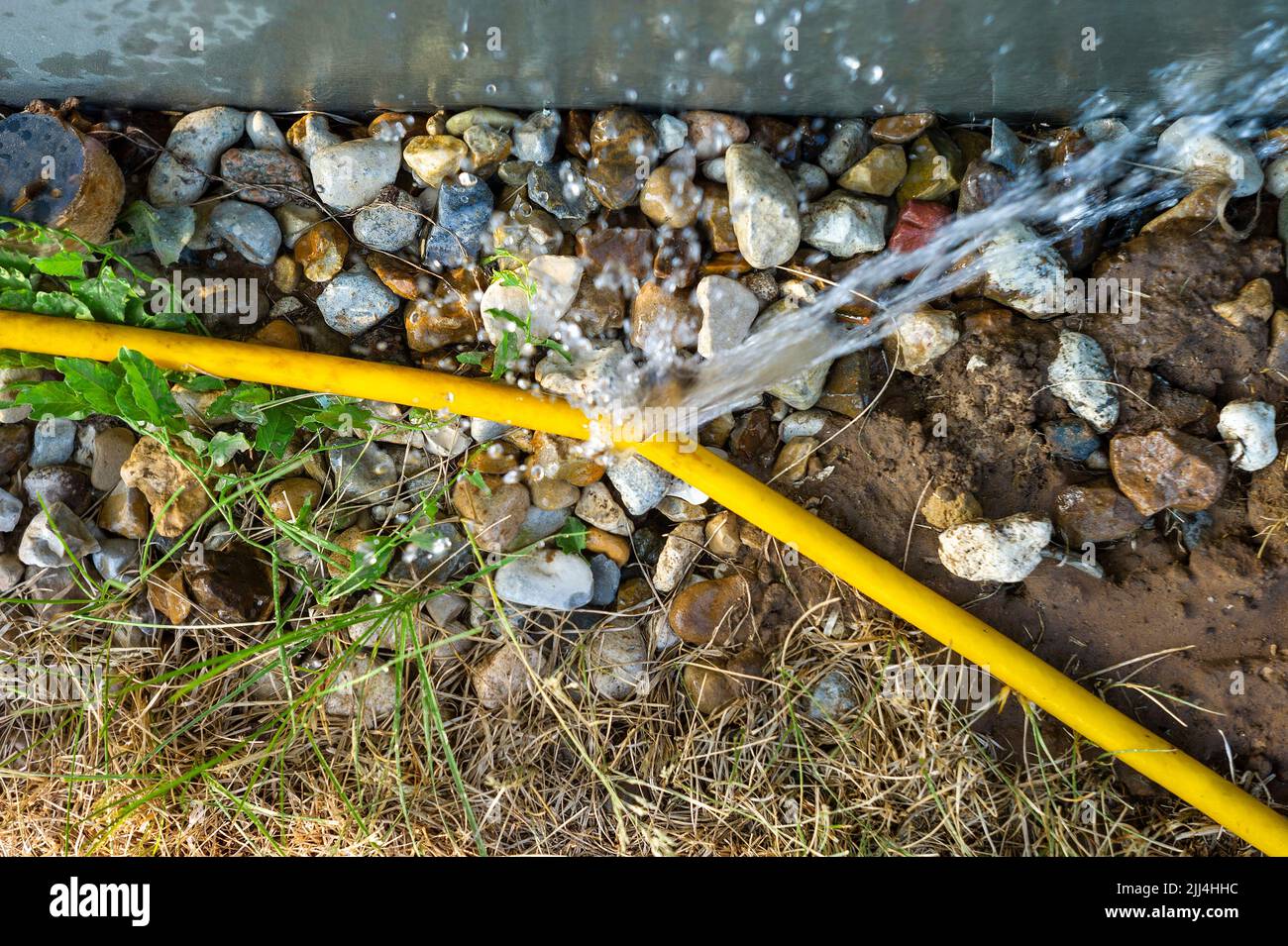 Overhead hose hi-res stock photography and images - Alamy