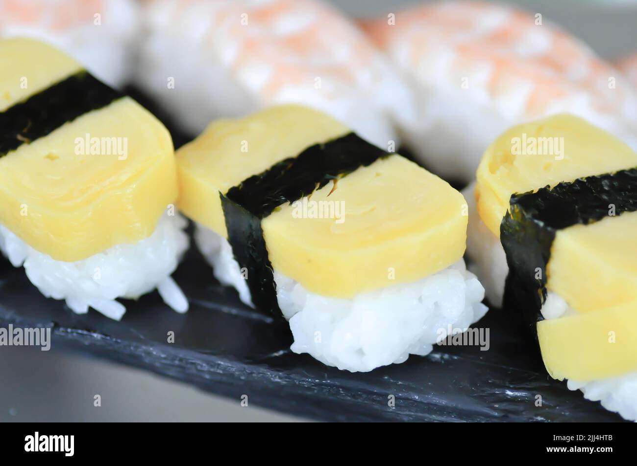 sushi or egg sushi , rice topped with egg and shrimp sushi or steam egg ...