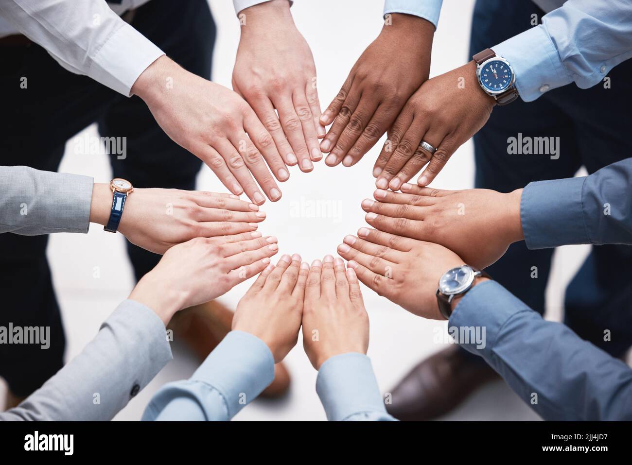 Side by side for shared success. a group of unrecognizable ...