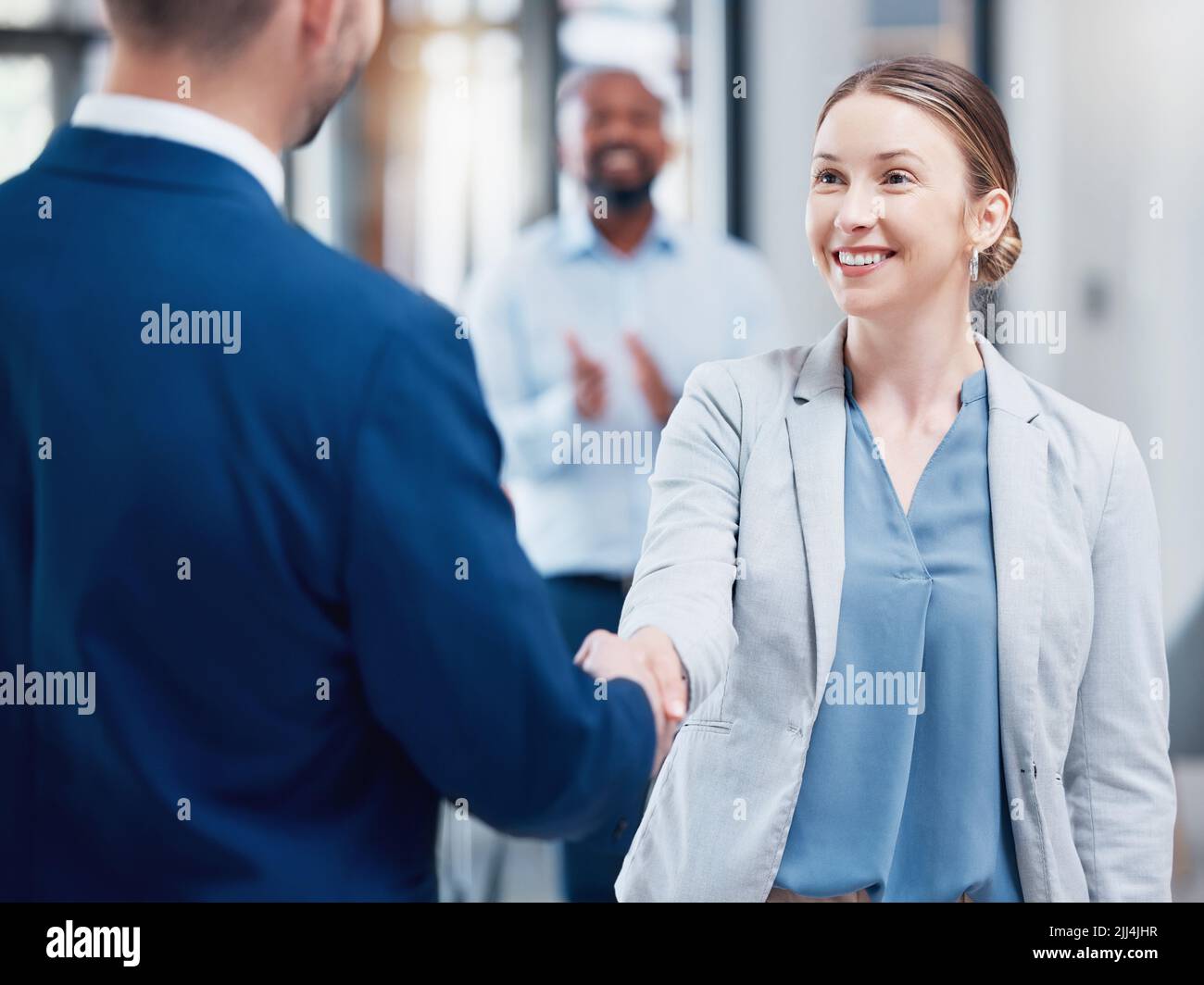 Young man woman shake hands hi-res stock photography and images - Alamy
