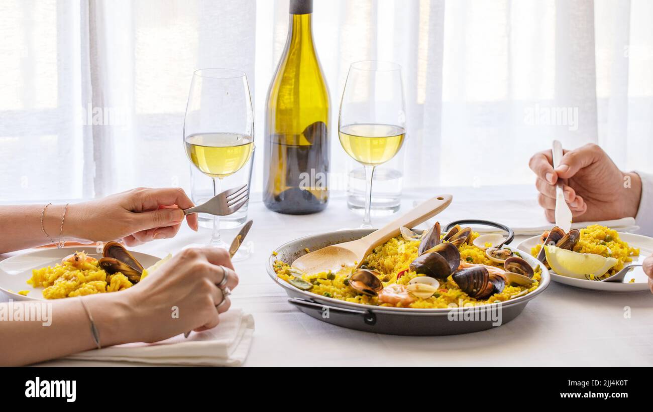 Restaurant fish dish spain couple hi-res stock photography and images ...