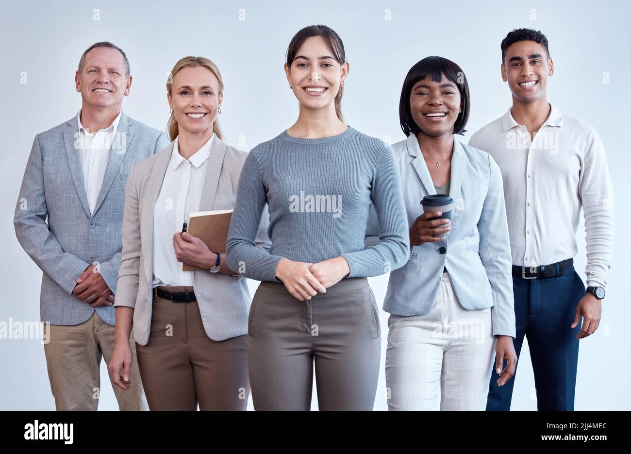 Success flows where teamwork goes. Portrait of a group of ...