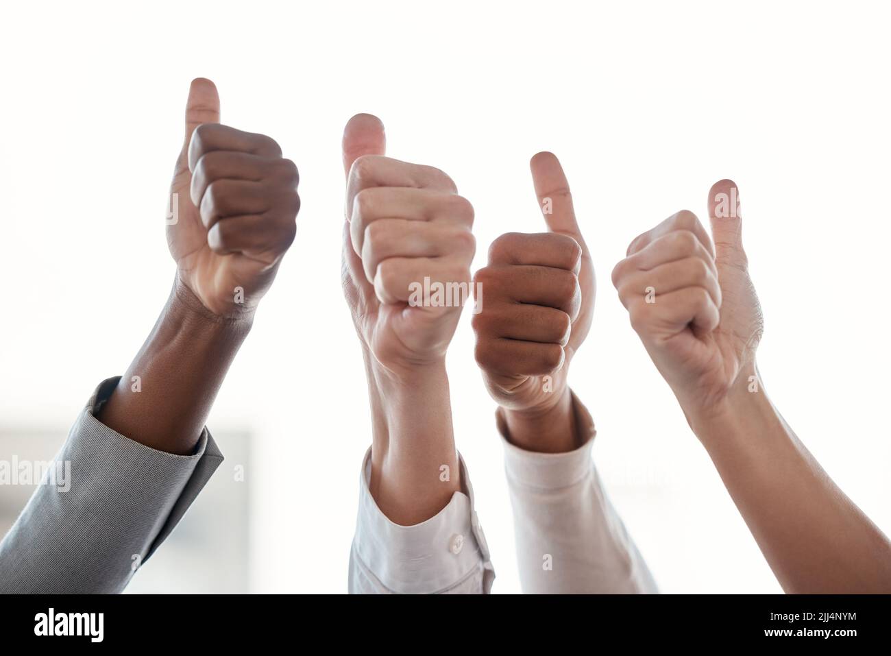 Four hands giving thumbs up hi-res stock photography and images - Alamy