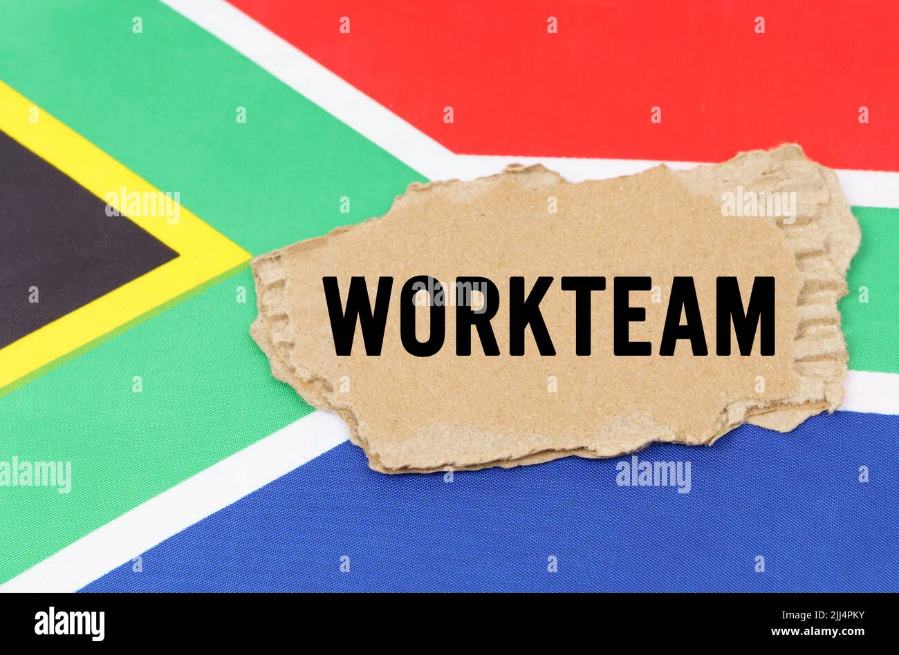 Business and finance concept. On the flag of South Africa lies a ...