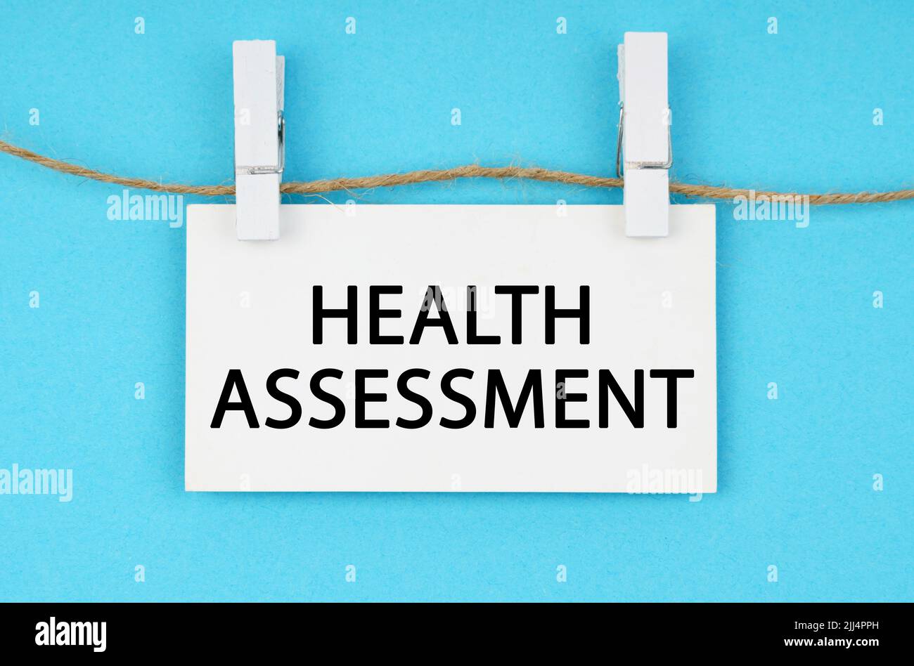 Medicine and health concept. On a blue background, a white plaque hangs ...