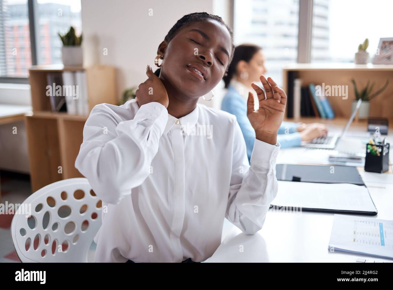 Restraint is not her strong suit. a young businesswoman experiencing ...