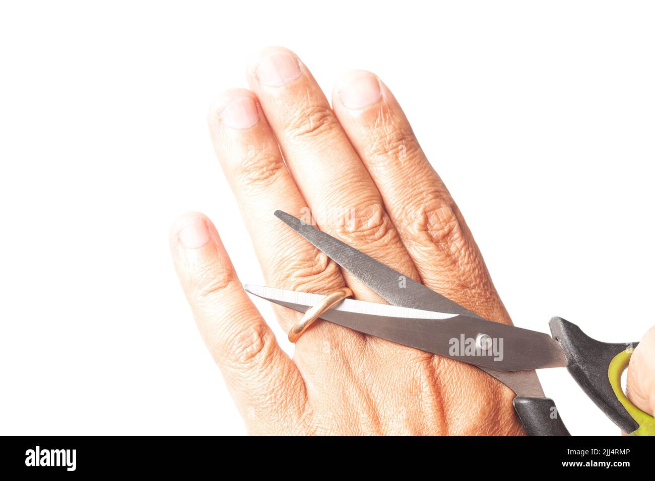 man's hand cuts an engagement ring with scissors Stock Photo - Alamy