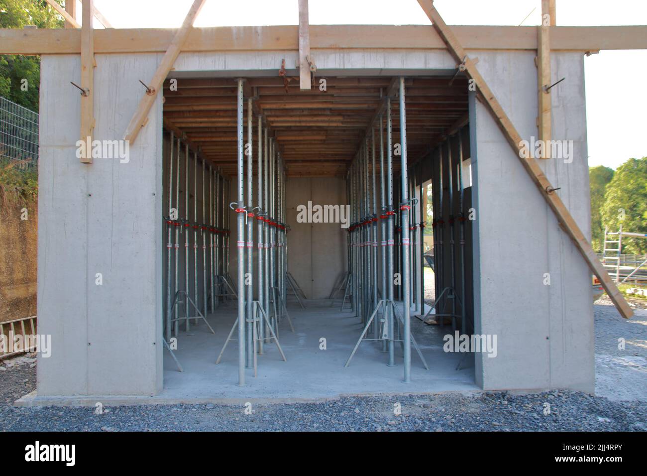 Ceiling of a building is prepared with struts and supports for ...