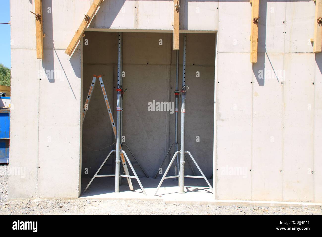 Ceiling of a building is prepared with struts and supports for ...