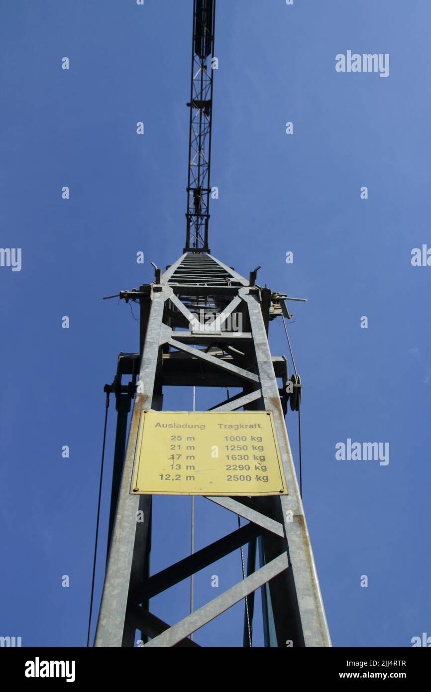 Table with the maximum weight on a construction crane Stock Photo - Alamy