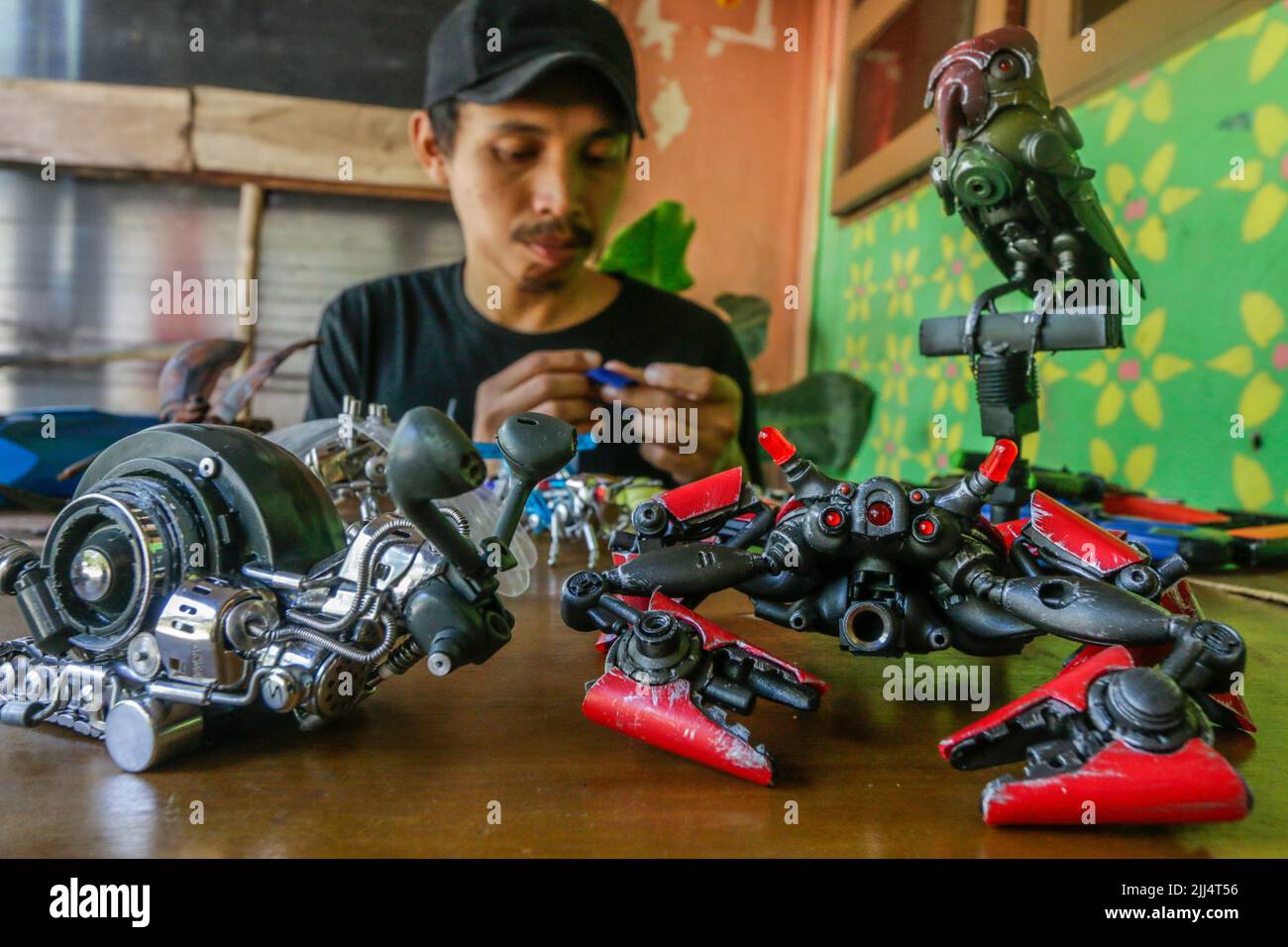Yusuf Uses used goods into miniature robots with animal characters ...