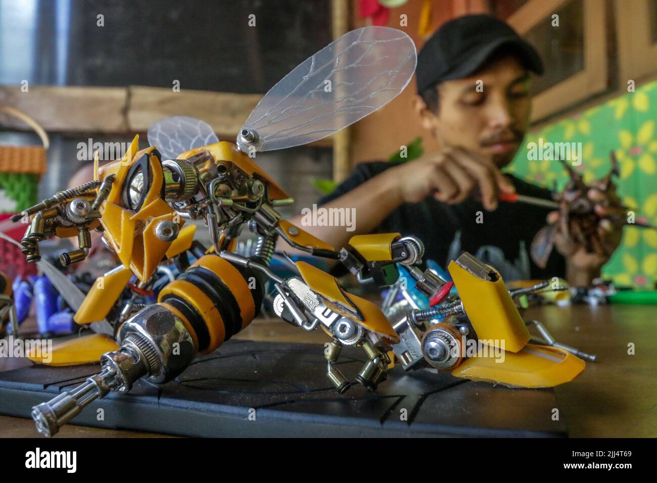 Yusuf Uses used goods into miniature robots with animal characters ...