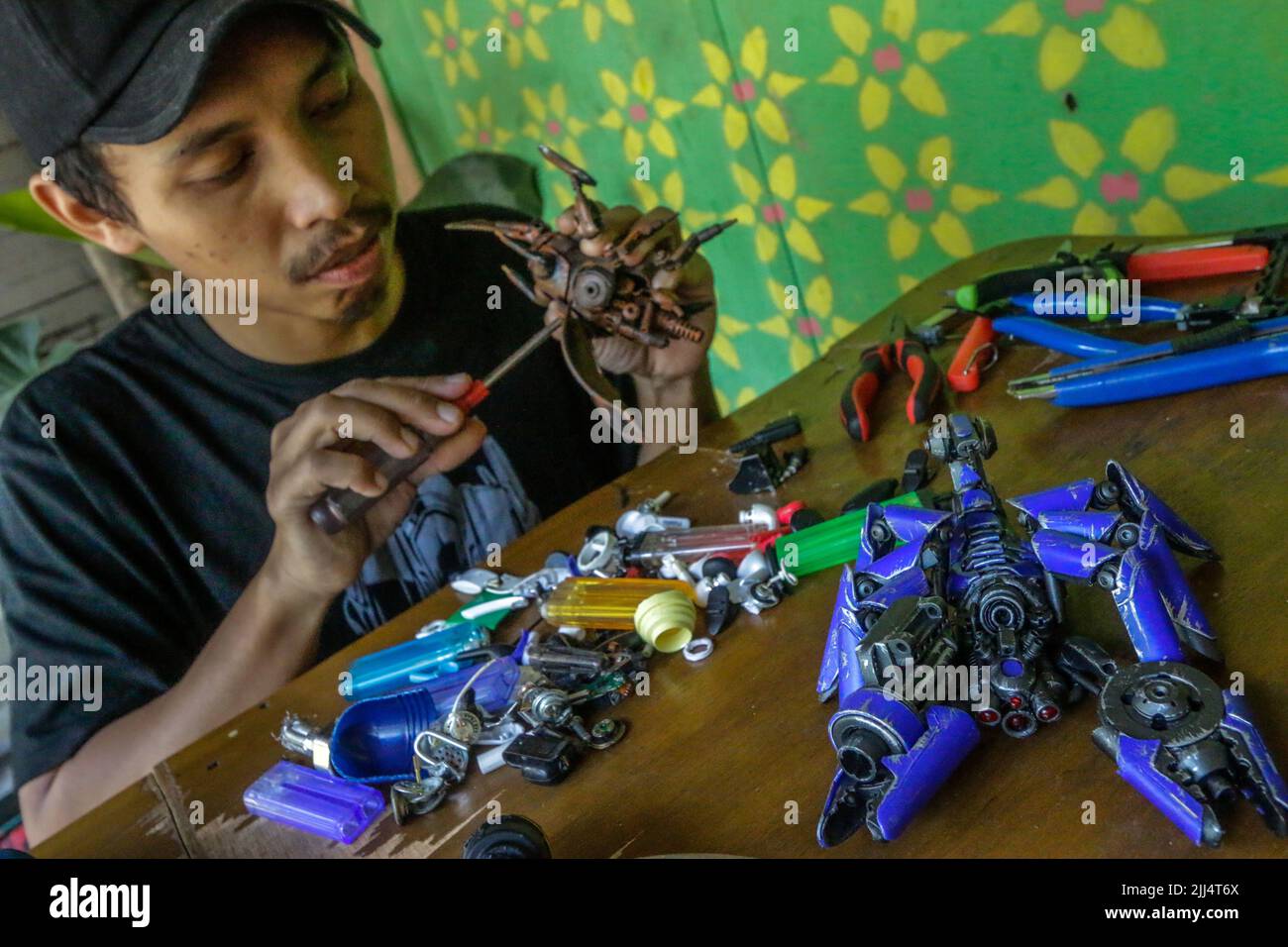 Yusuf Uses used goods into miniature robots with animal characters ...