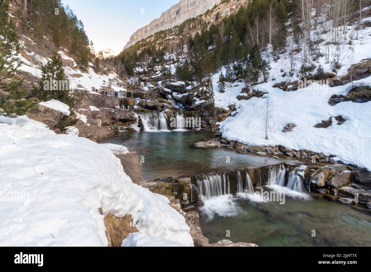 waterfall in ordesa national park in the spanish pyrenees in winter ...
