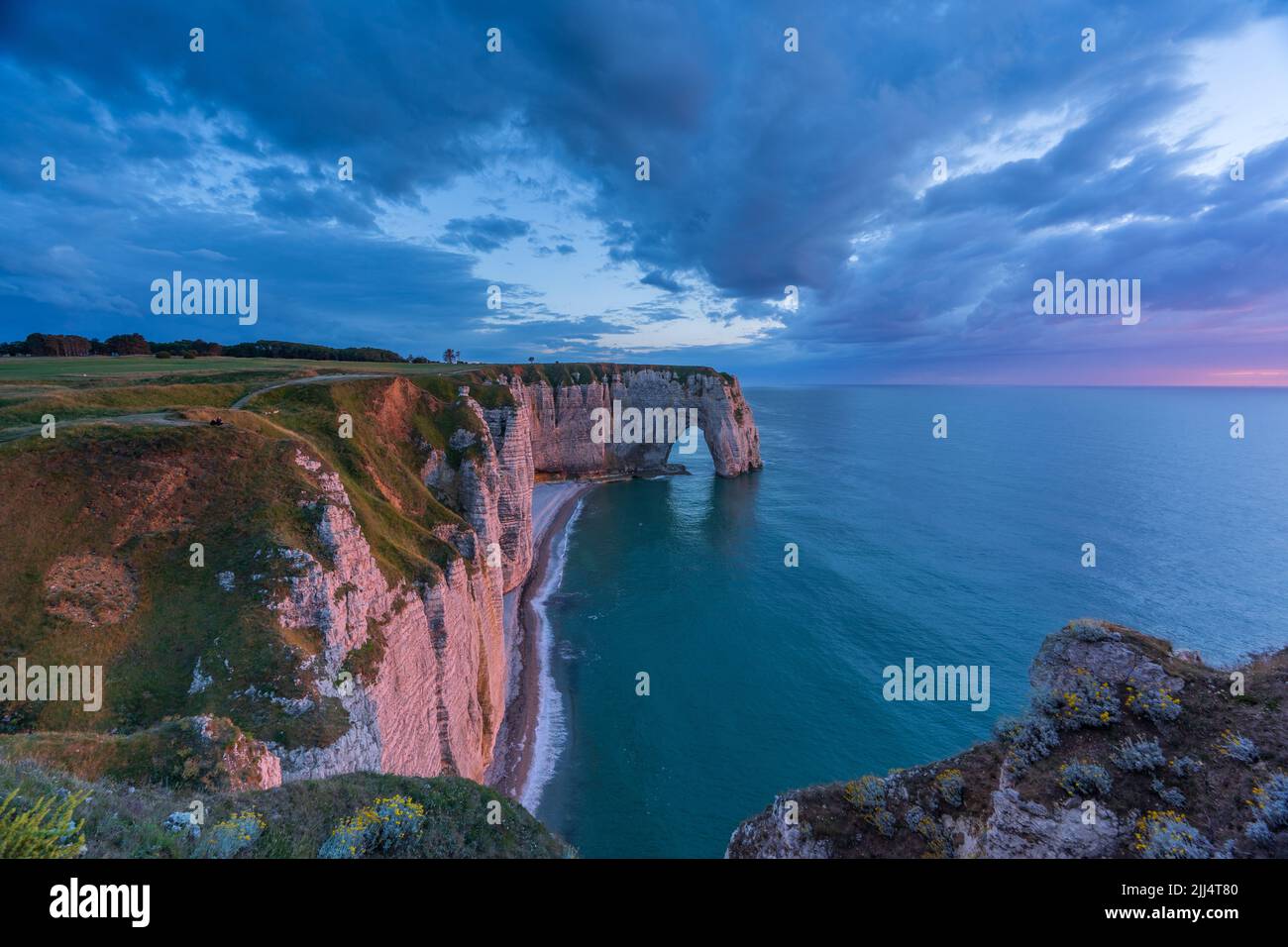 Sunset over the beautiful Normandy cliffs of Etretat Stock Photo - Alamy