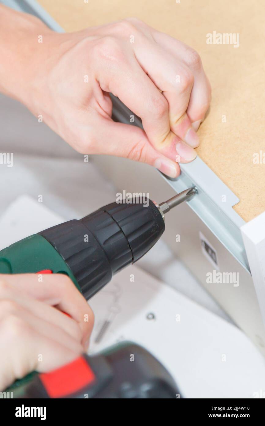 Assembling drawers hi-res stock photography and images - Alamy