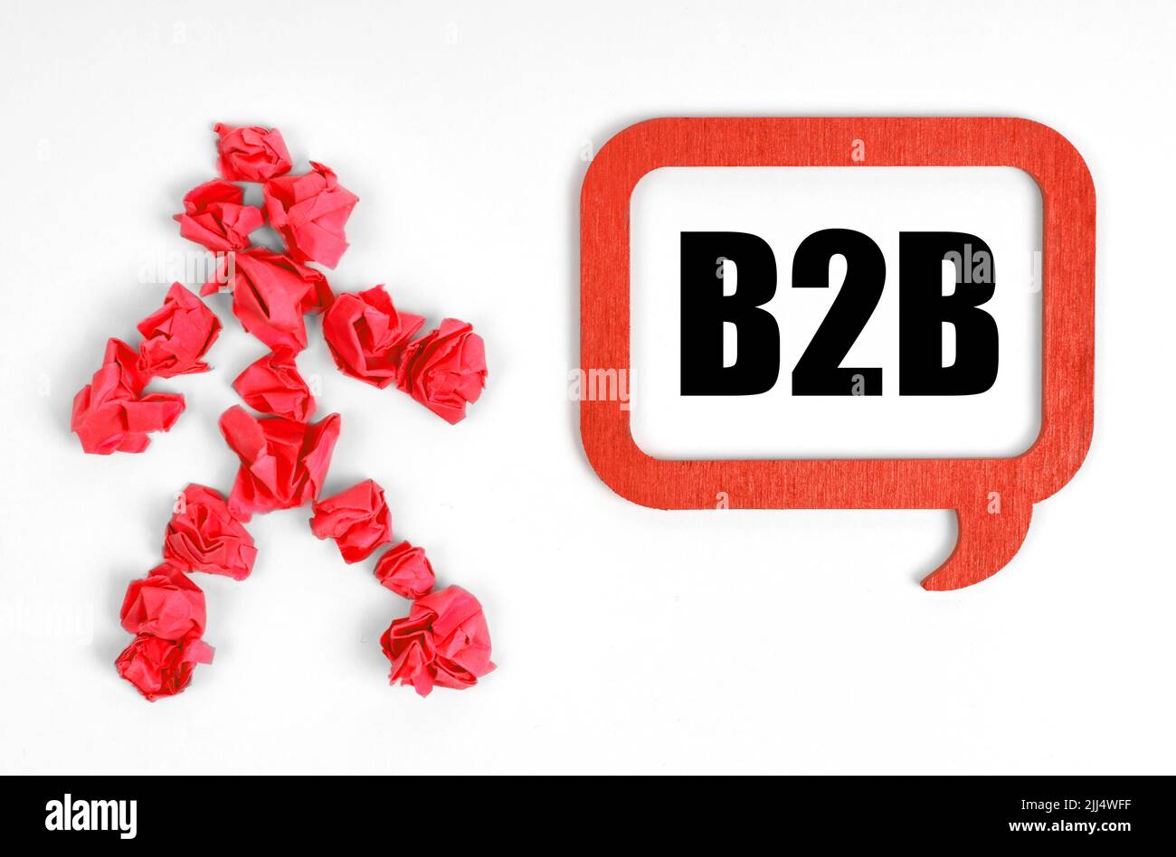 Business concept. On a white background, a red paper man and a sign ...