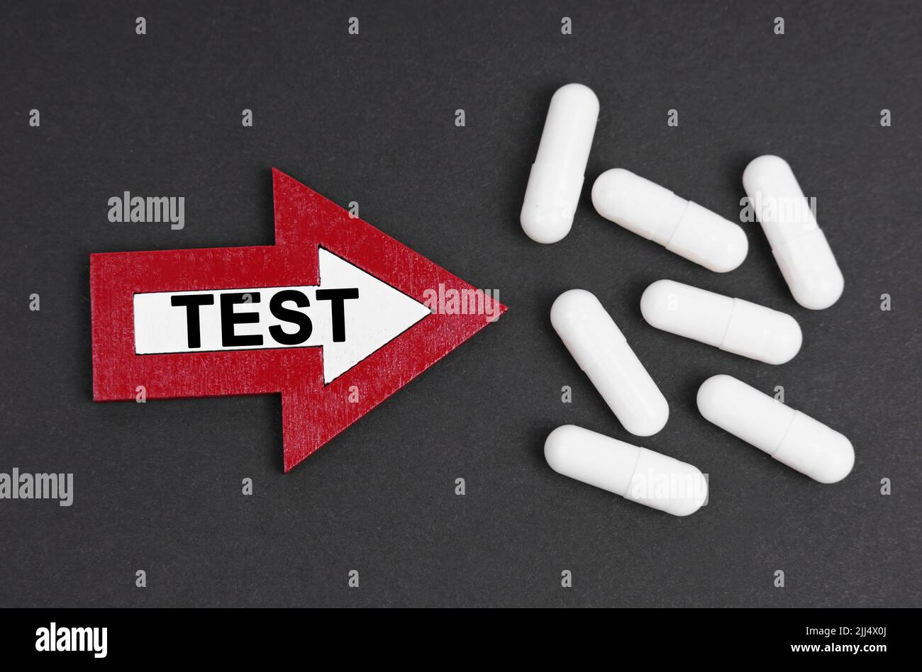 Medicine concept. Tablets are on a black background. They are indicated ...