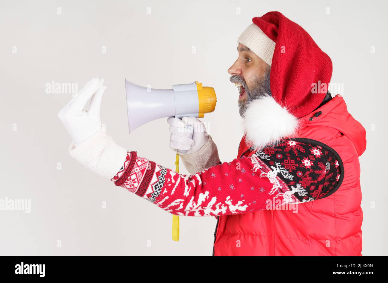 New Year and Christmas concept. Santa Claus is emotionally talking ...