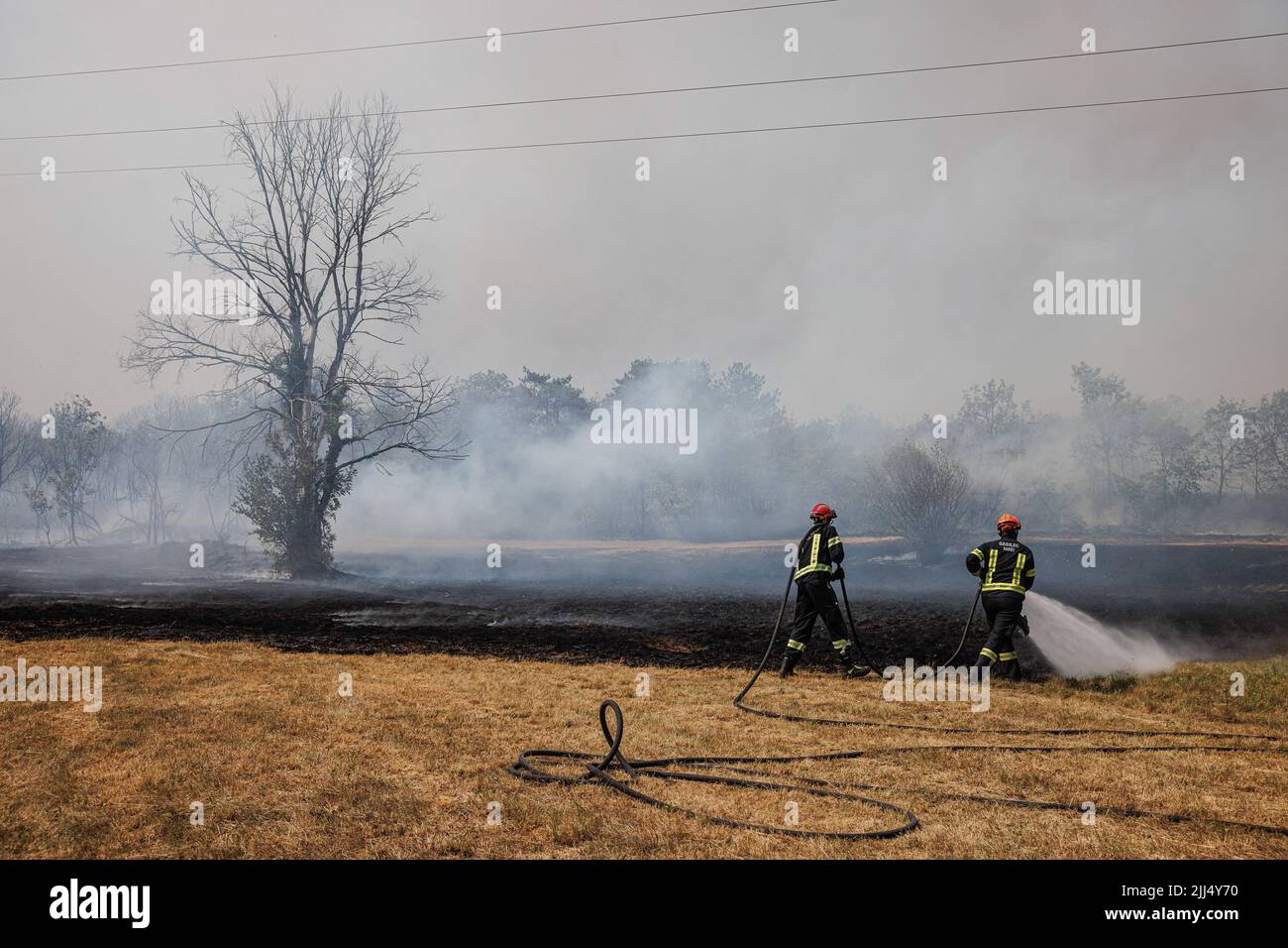 Karst, Slovenia. 22nd July, 2022. Firemen battle a large wildfire that ...