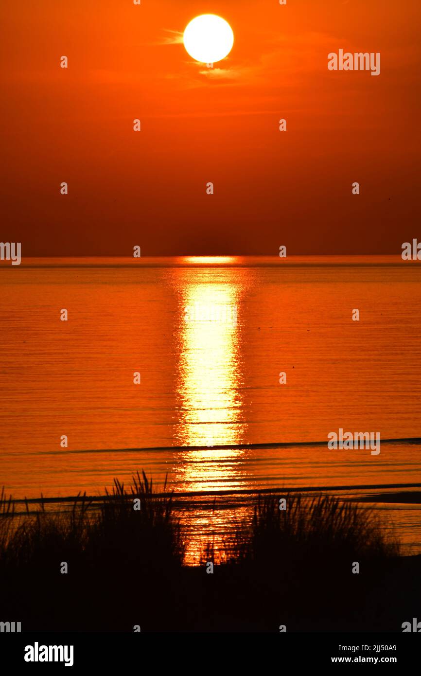 Deep orange sunset hi-res stock photography and images - Alamy