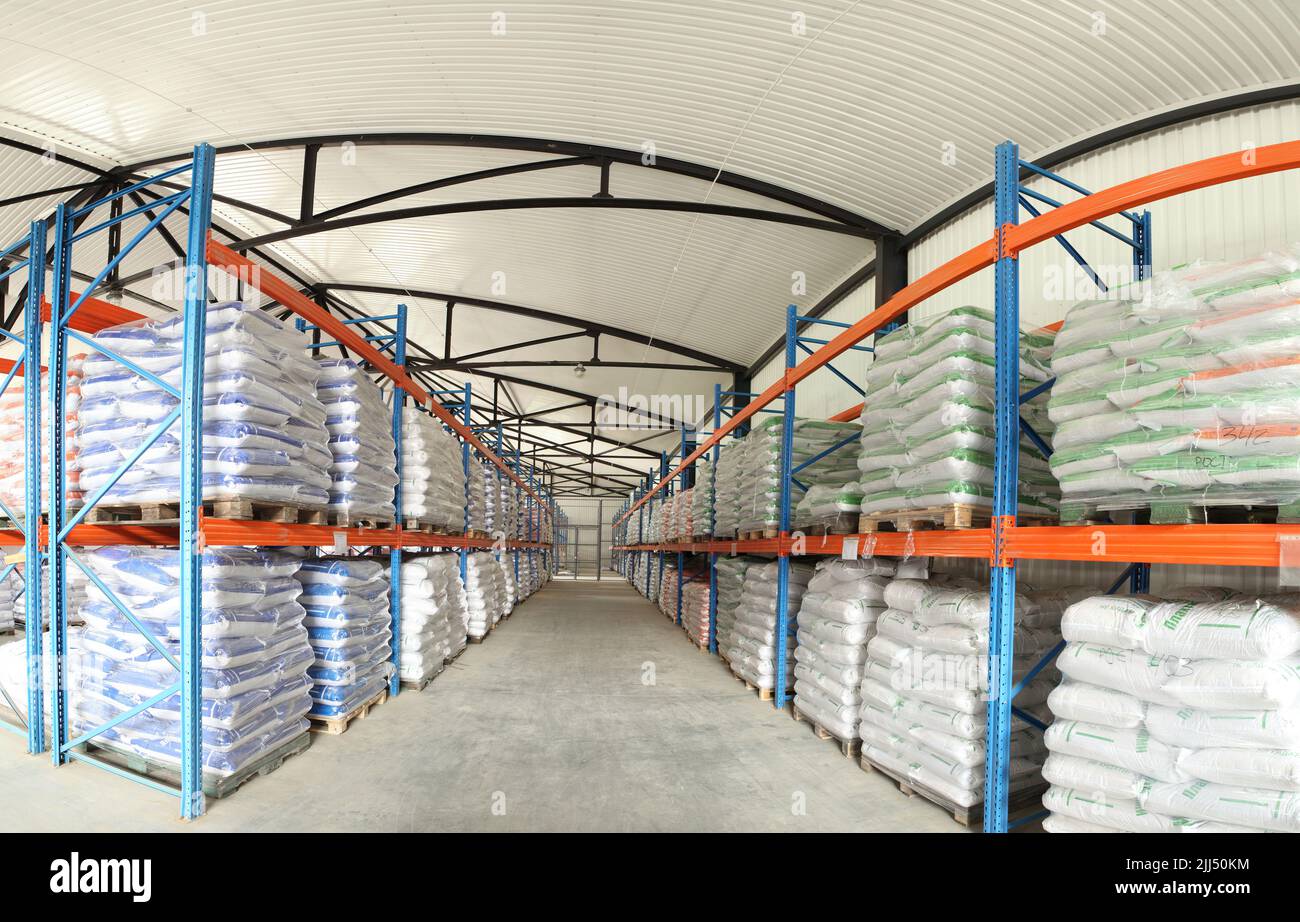 Large warehouses of sacks of animal feed. Veterinary production. Animal ...
