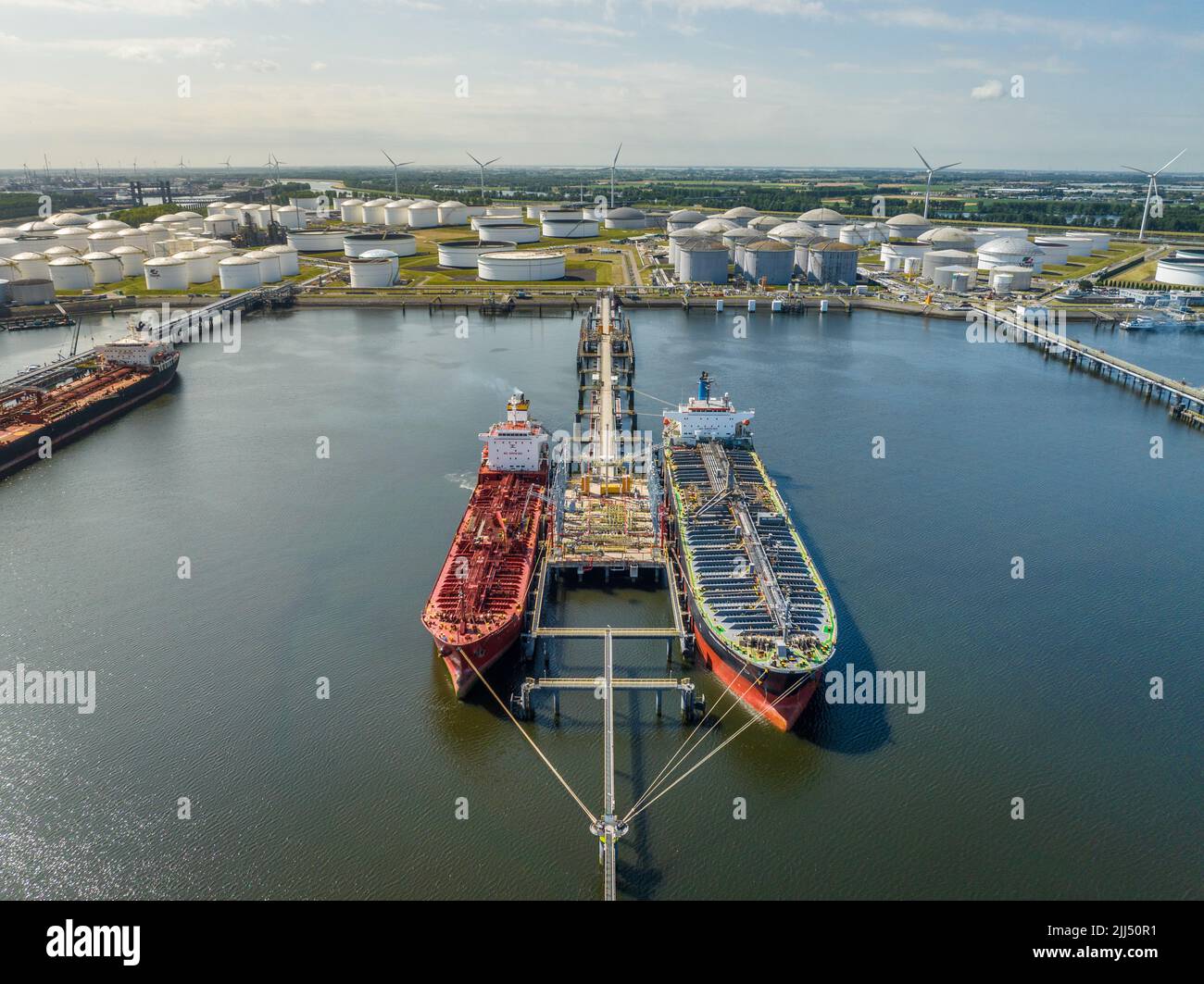 Crude Oil Tankers Unloading Cargo at a Refinery Depot Stock Photo - Alamy
