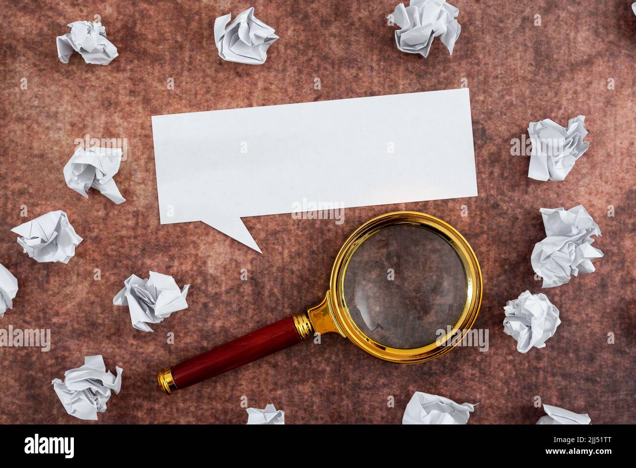 Speech Bubble Made Of Sheet With Magnifying Glass Surrounded With ...