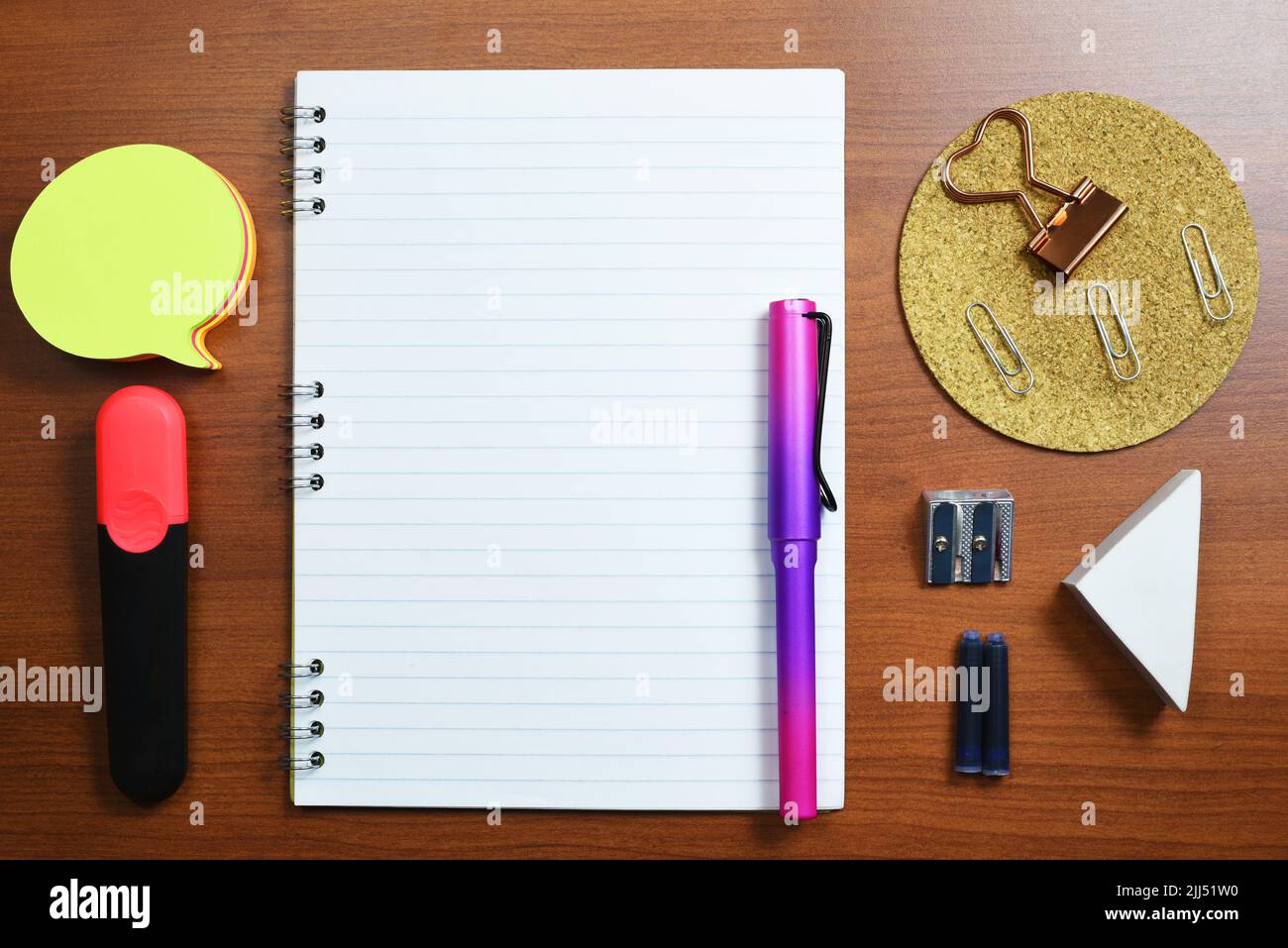 Notebook With Important Message On Desk With Pen, Sharpener, Notes ...