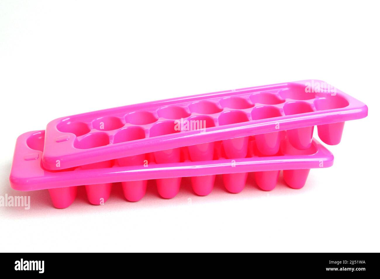Plastic pink mold for ice. Refrigeration of drinks Stock Photo - Alamy