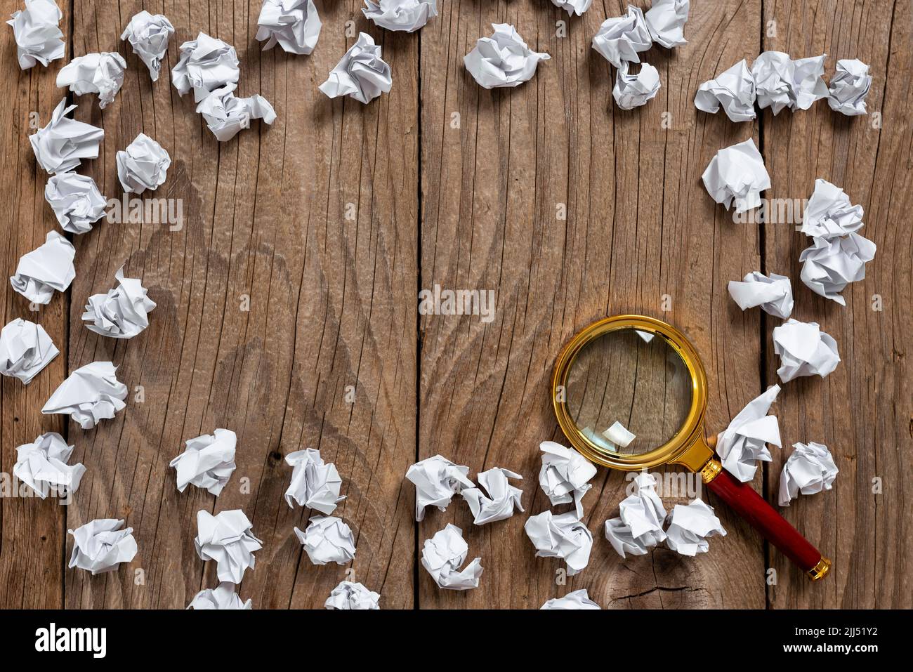 Paper Wraps And Magnifier Placed Around Important Information. Wrinkled ...
