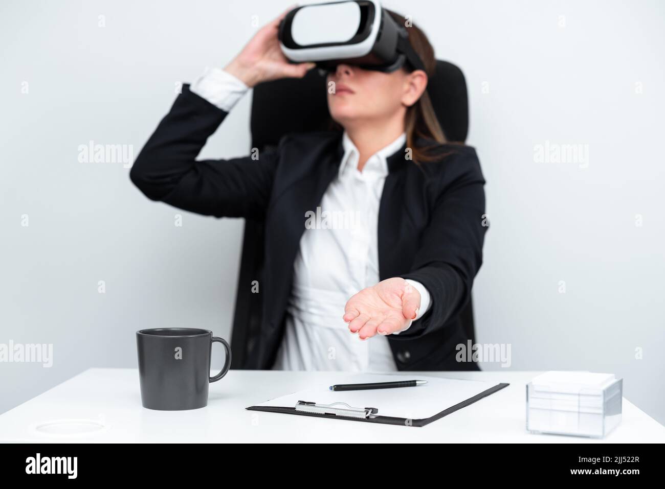 Female Executive Gesturing While Learning Professional Skill Through ...