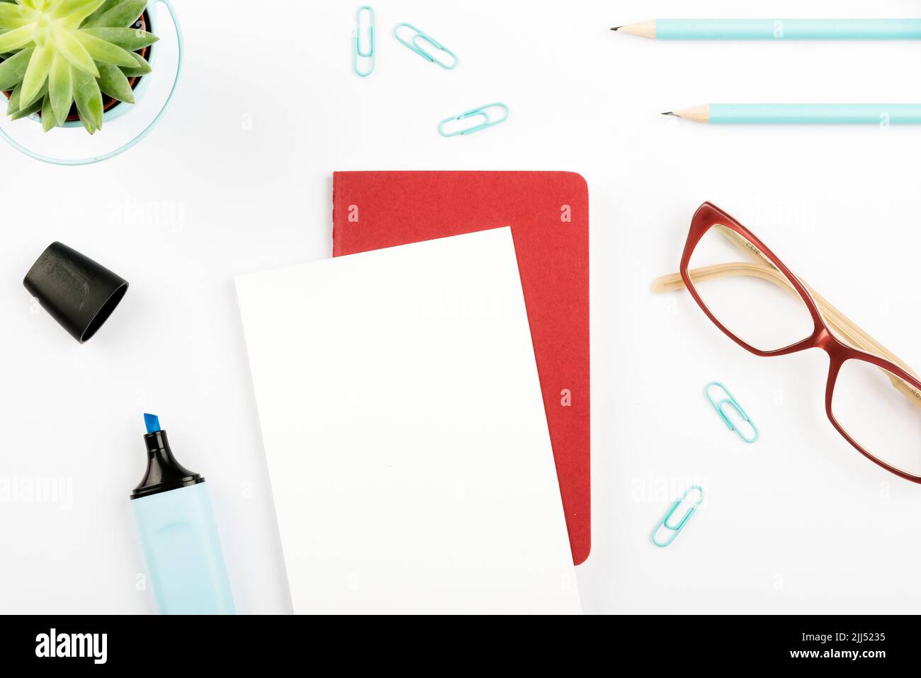 Important Announcements On Piece Of Paper Over Notepad On Desk With ...