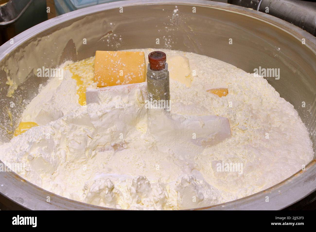 Mixing mass for the production of processed cheese. Cheese production ...