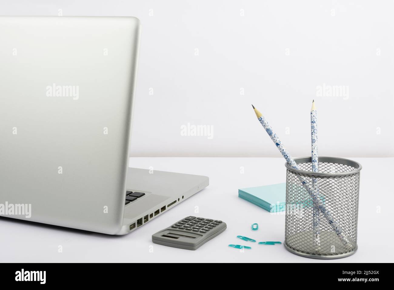 Lap Top, Case With Pencils, Calculator, Paperclips And Sticky Notes ...