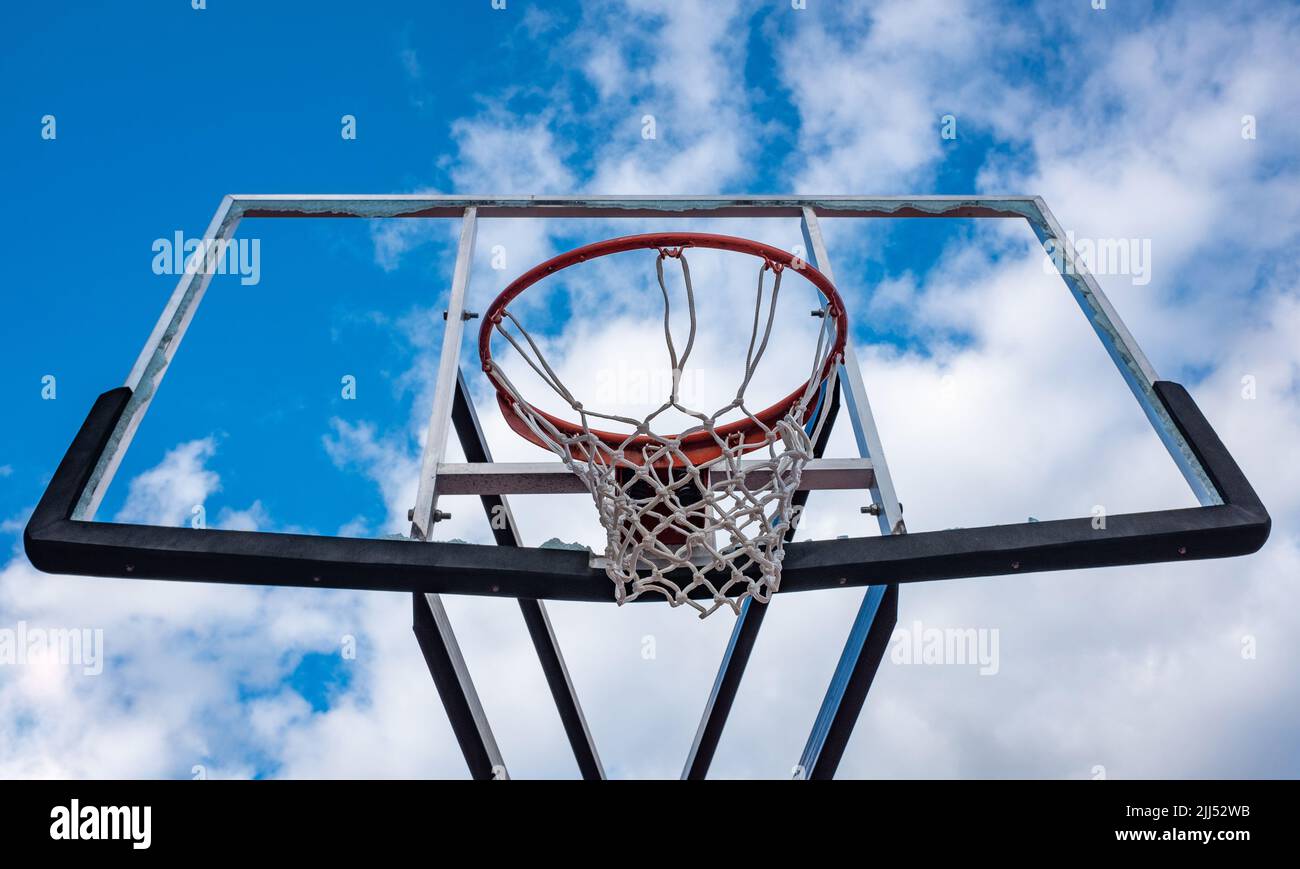 Broken glass backboard and broken hoop on the basketball court Stock ...