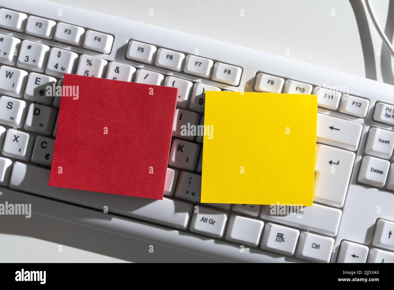 Important Messages Written On Two Notes On Desk Above Keyboard. Crutial ...