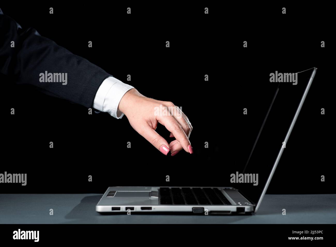 Businesswoman Pointing Important Messages On Lap Top. Woman Showing ...