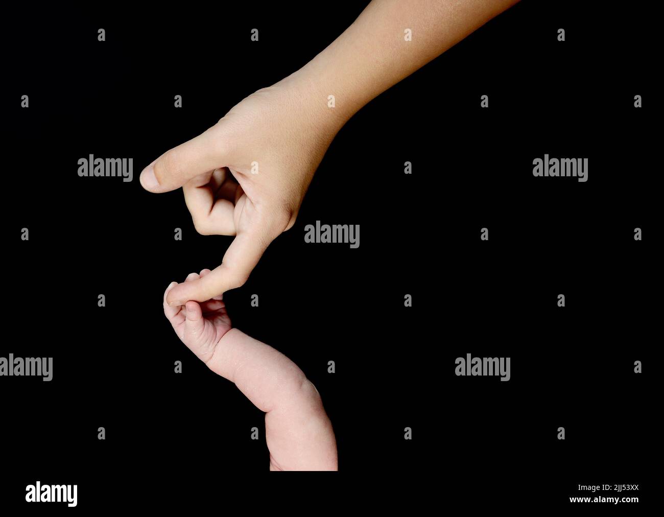 Baby grasp finger black hi-res stock photography and images - Alamy