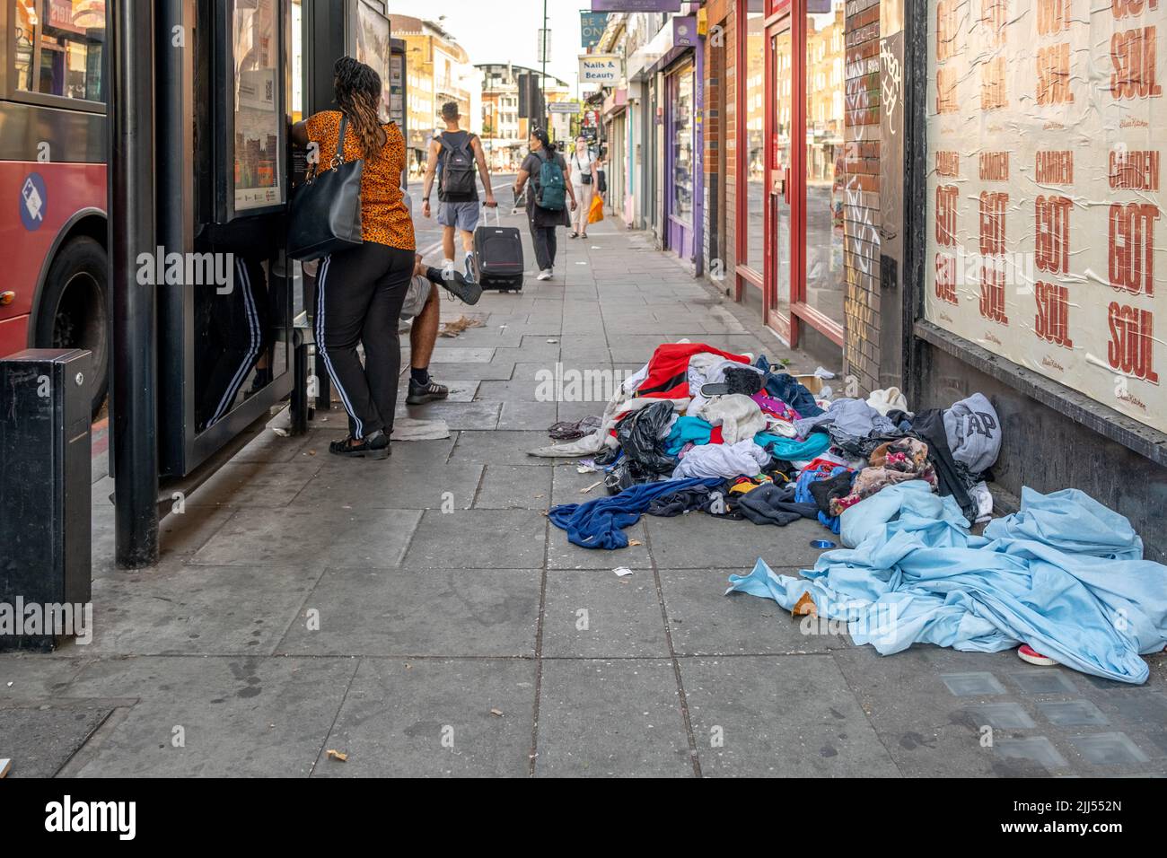 Old Dirty Clothes left discarded on a high street in Camden, North ...