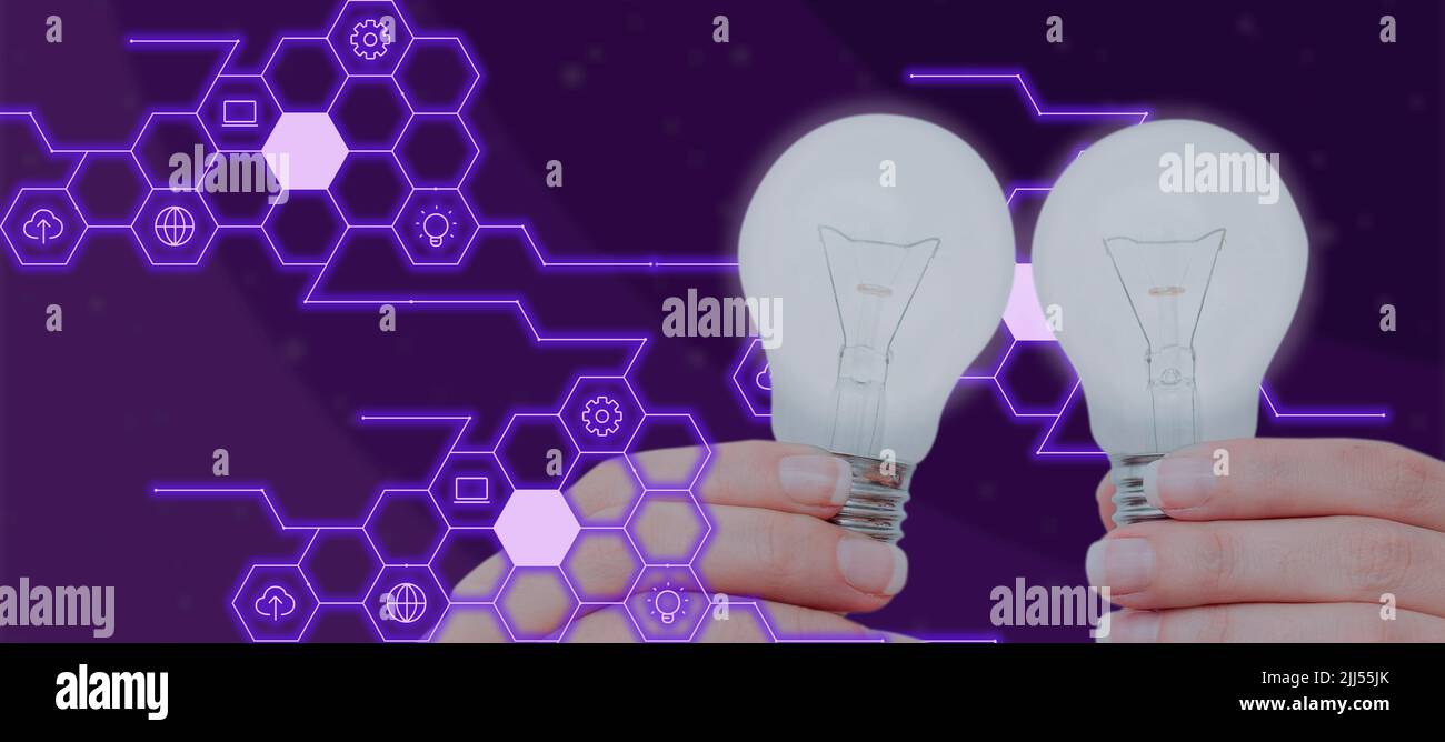 Hands Of Businesswoman Holding Electric Bulbs By Digital Graphical Multiple S And Hexagon Shape ...