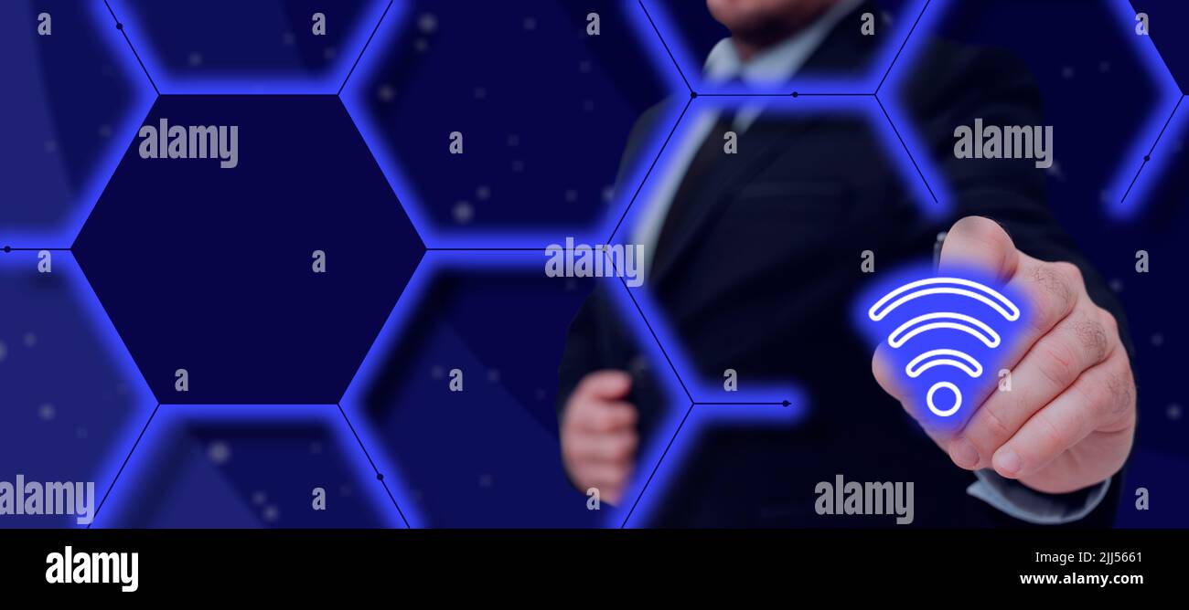 Businessman With A Pen Pointing On A Glowing Wi-Fi Signal In A Glowing ...