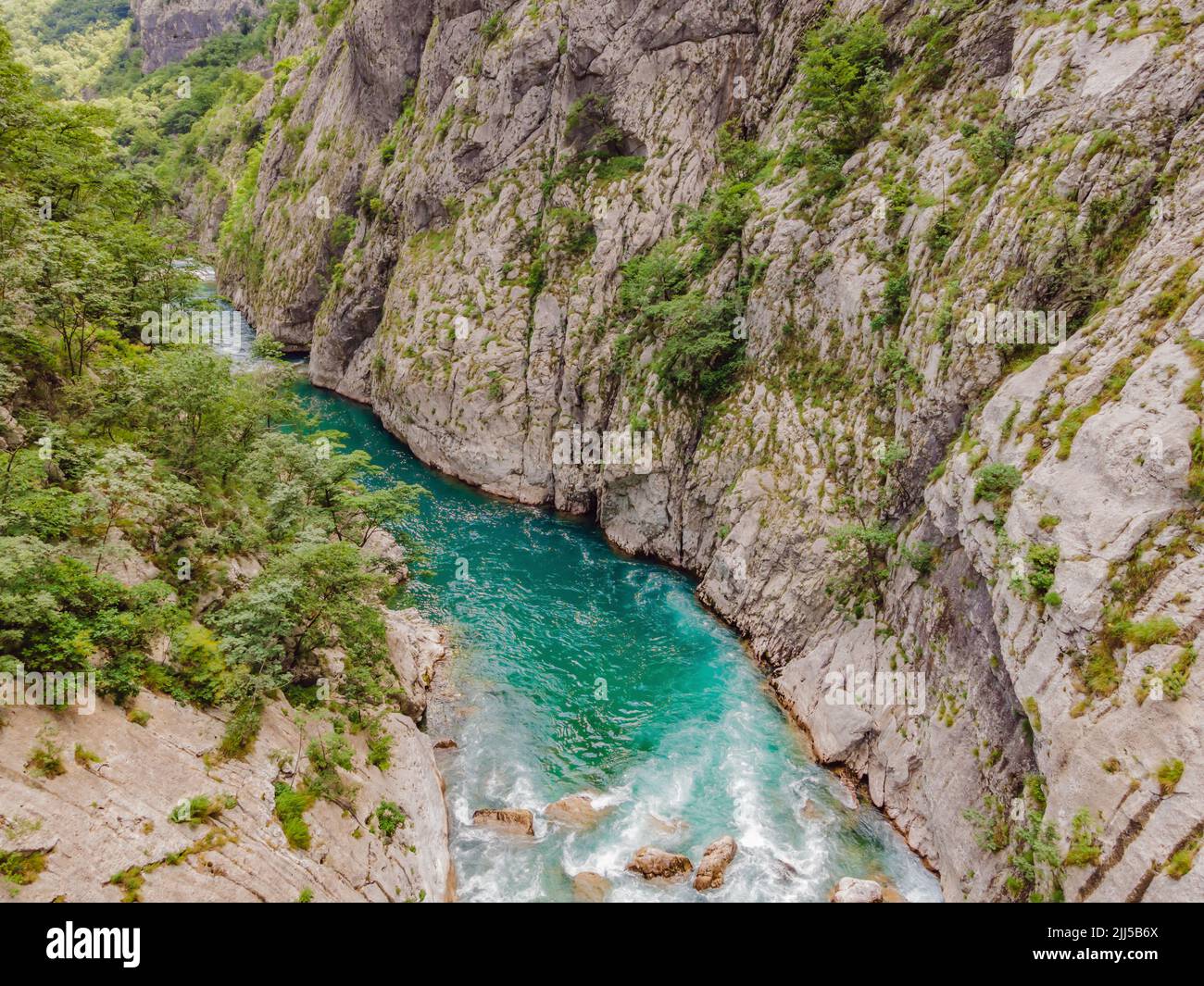 The purest waters of the turquoise color of the river Moraca flowing ...