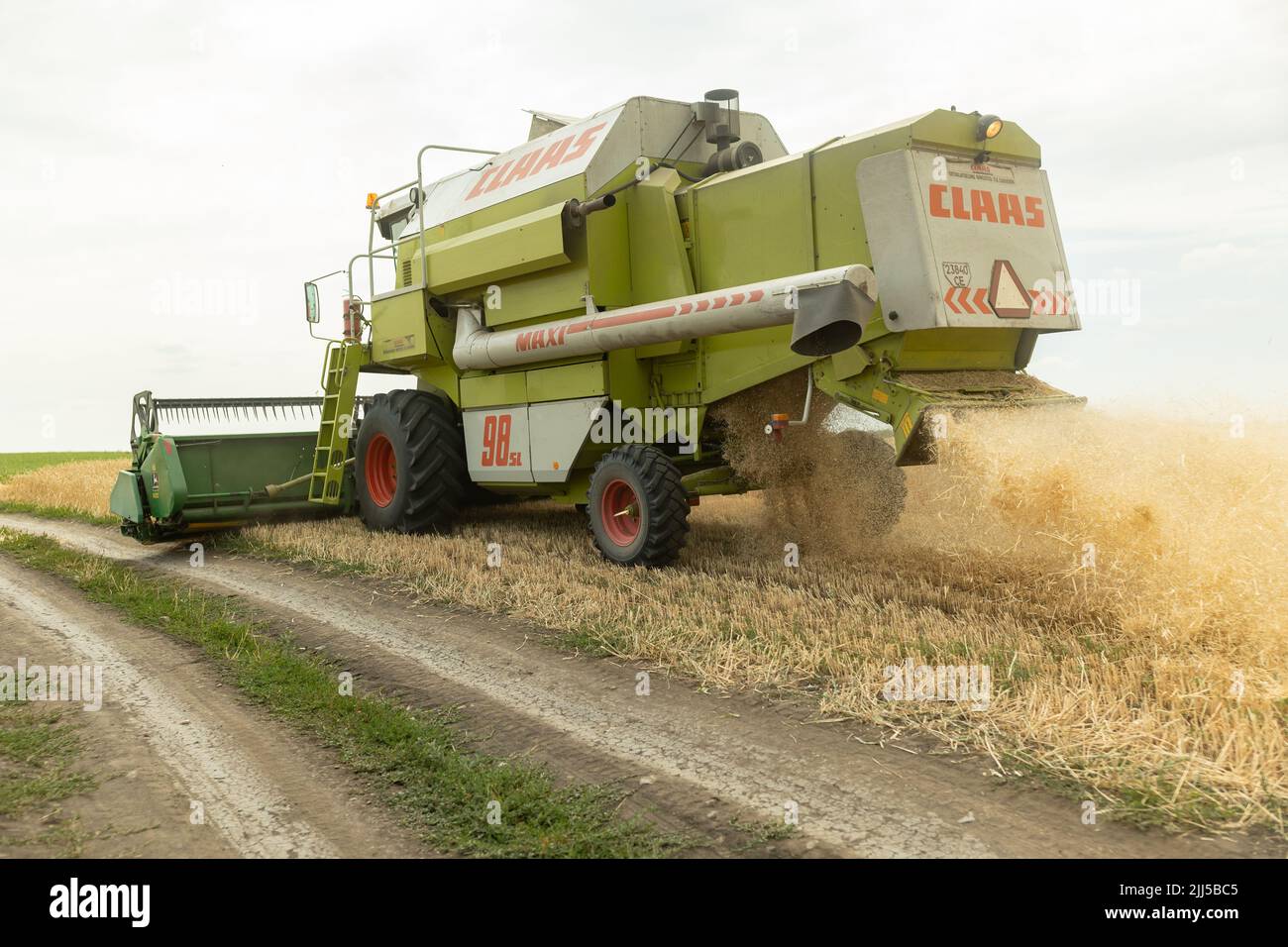 Ukraine, Vartekivtsi, July 19, 2022. Combine harvester harvests ripe ...
