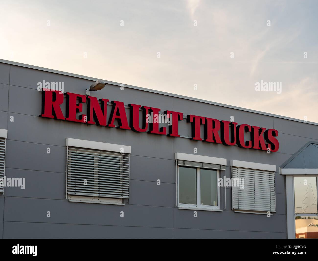 Renault Trucks lettering logo on a building exterior. Advertisement of ...